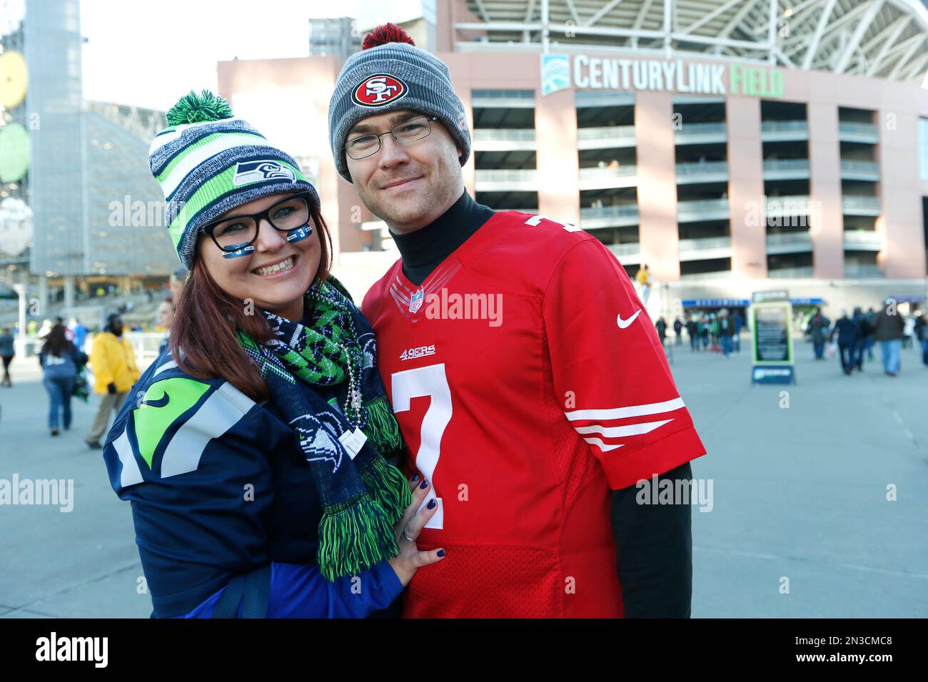 Seattle Seahawks fan Danielle Atwood, left, poses for a photo with her ...