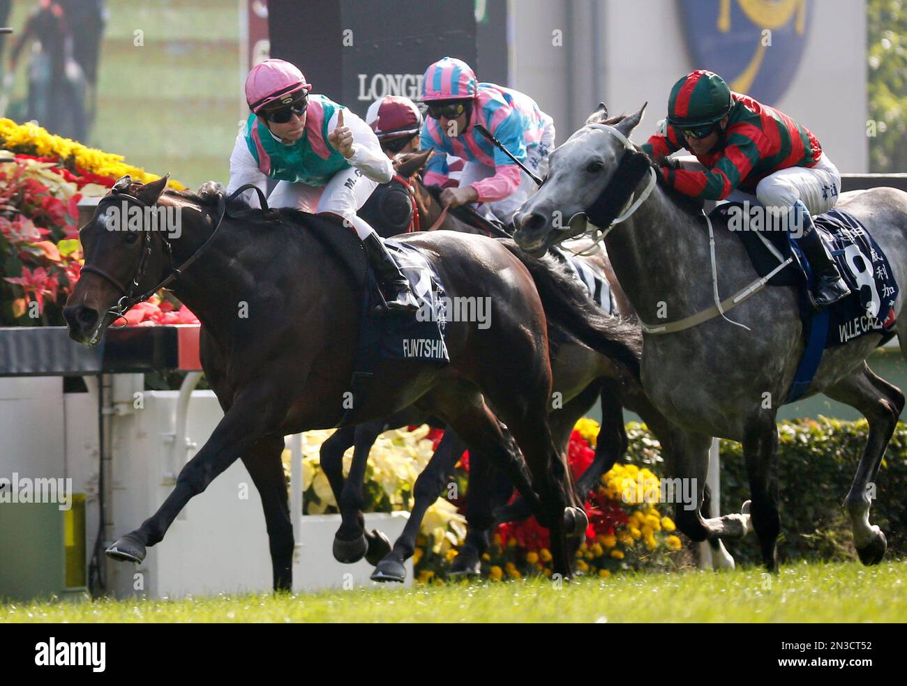 French jockey Maxime Guyon, riding French horse Flintshire, left ...