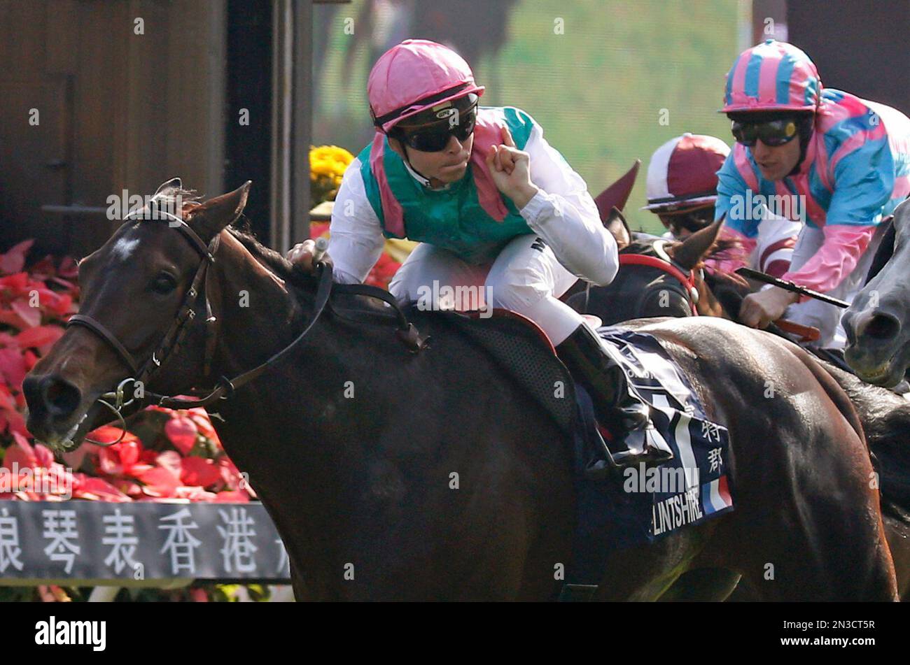 French jockey Maxime Guyon, riding French horse Flintshire, left ...