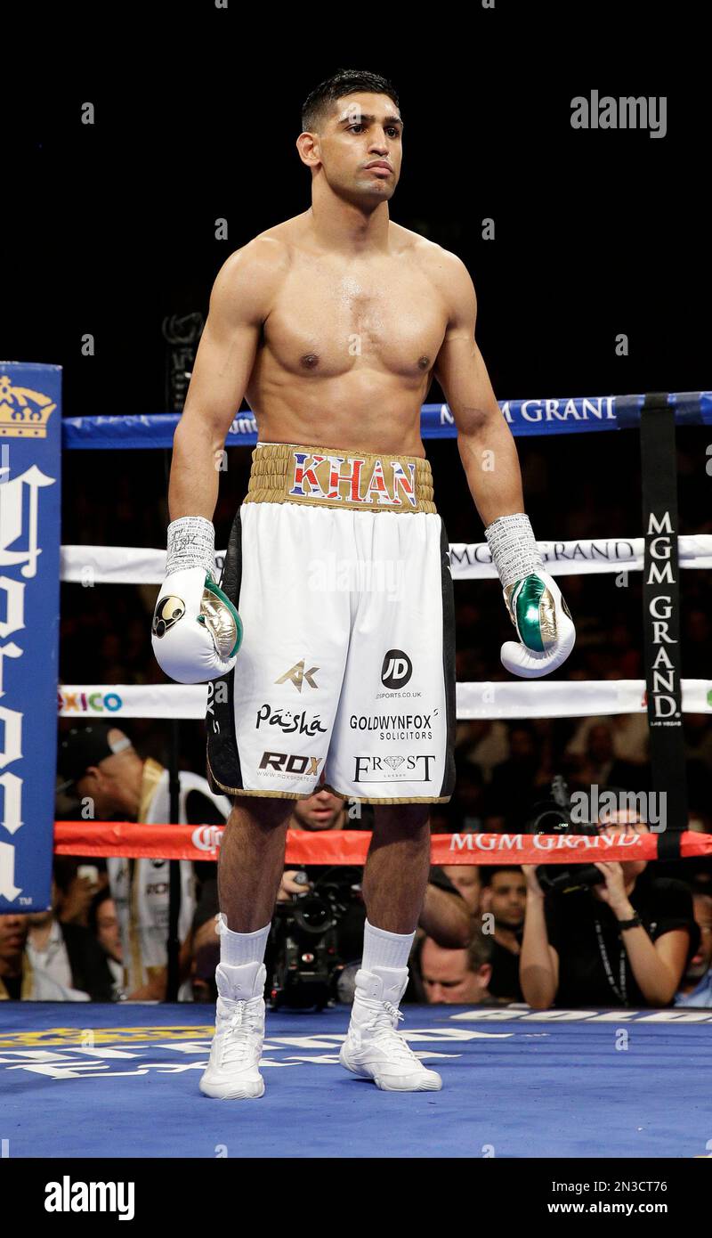 Amir Khan stands in his corner before fighting Devon Alexander during ...