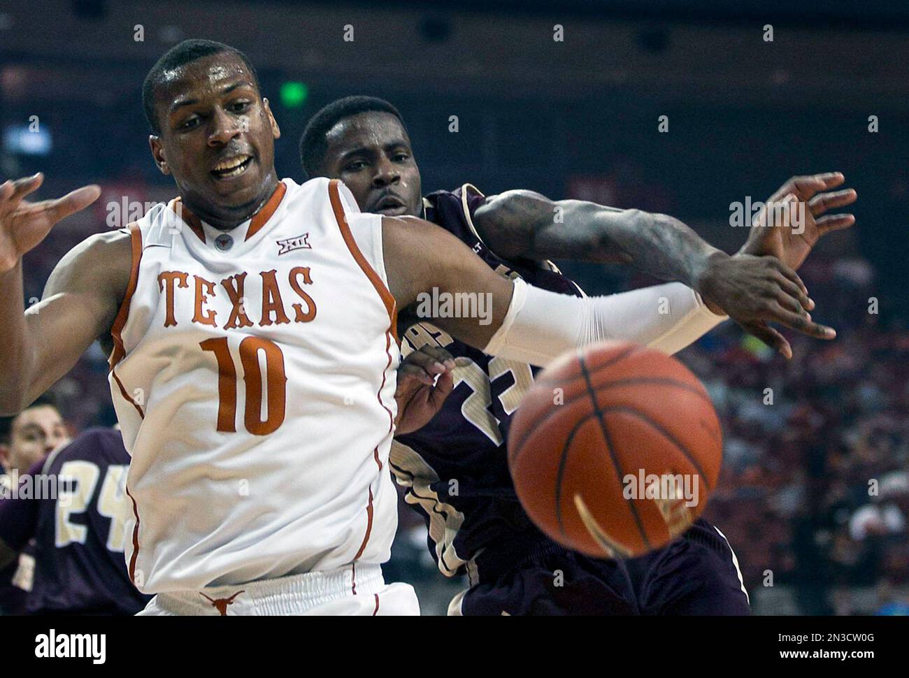 Texas Jonathan Holmes, (10) and Texas State JaMarcus Weatherspoon ...