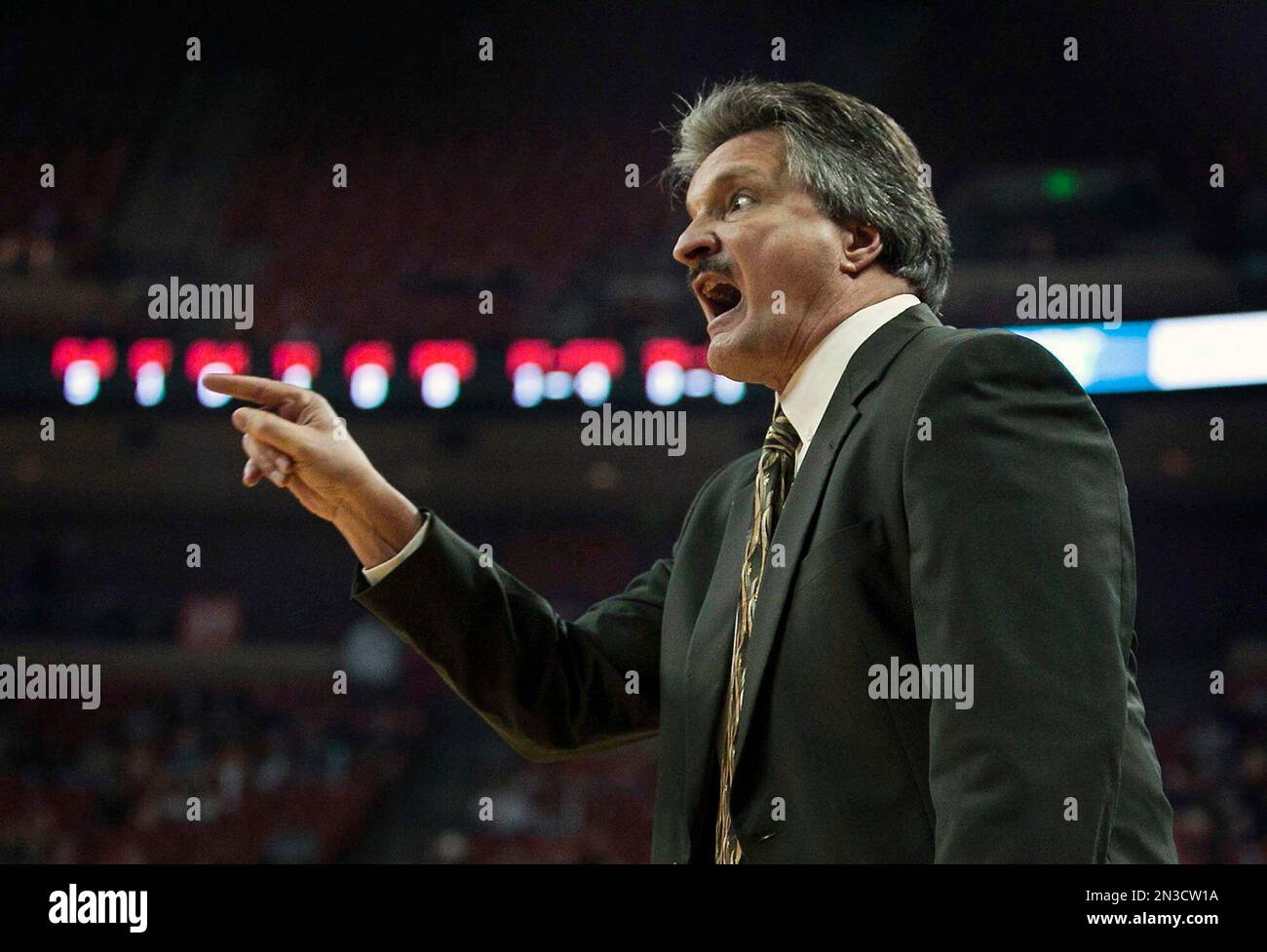 Texas State head coach, Danny Kasper, yells instructions to his team ...