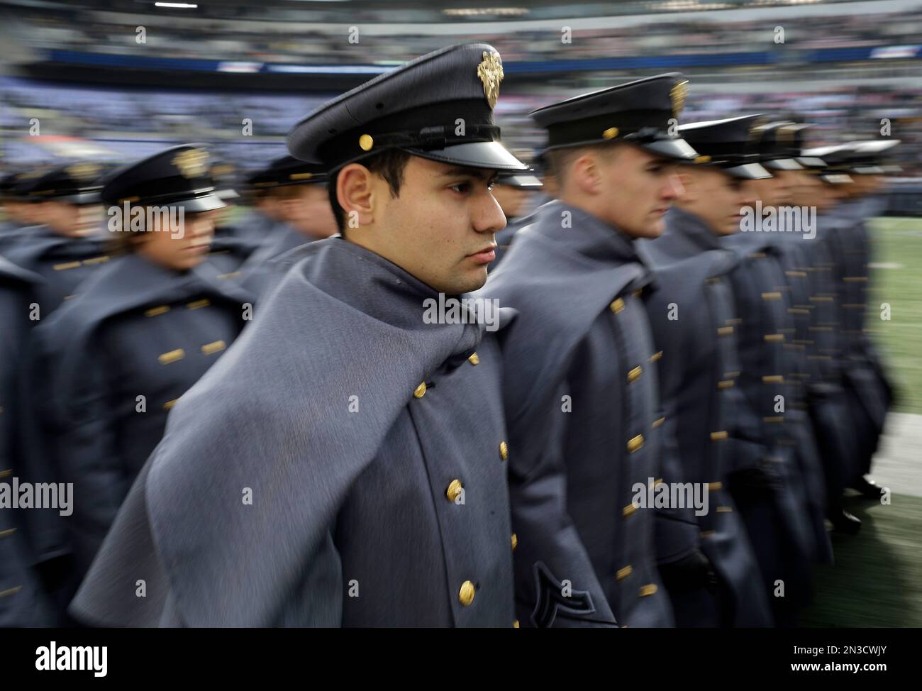 Army Cadets march on the field before the Army-Navy NCAA college ...