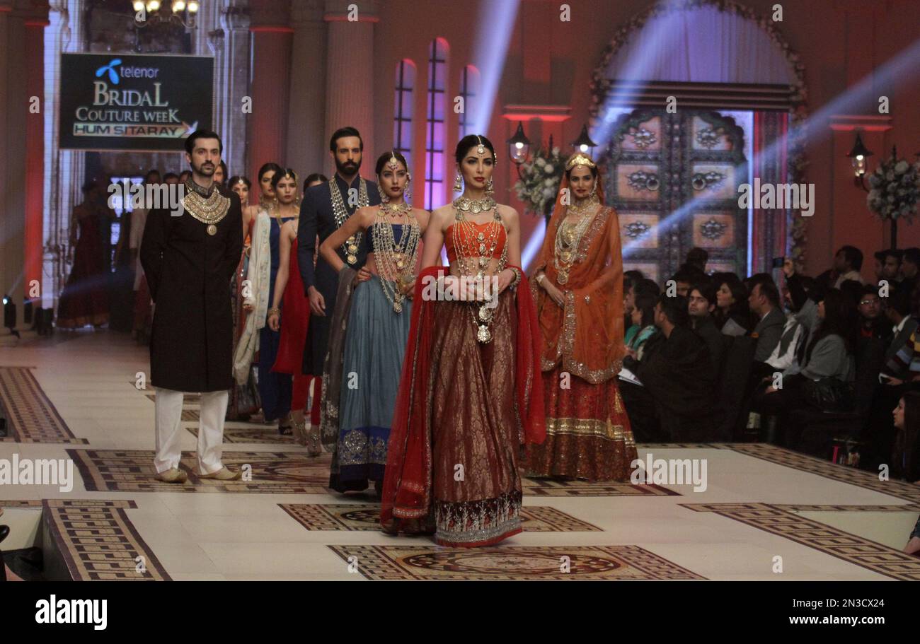 Pakistani models present creations by designer Samreen Vance during the ...
