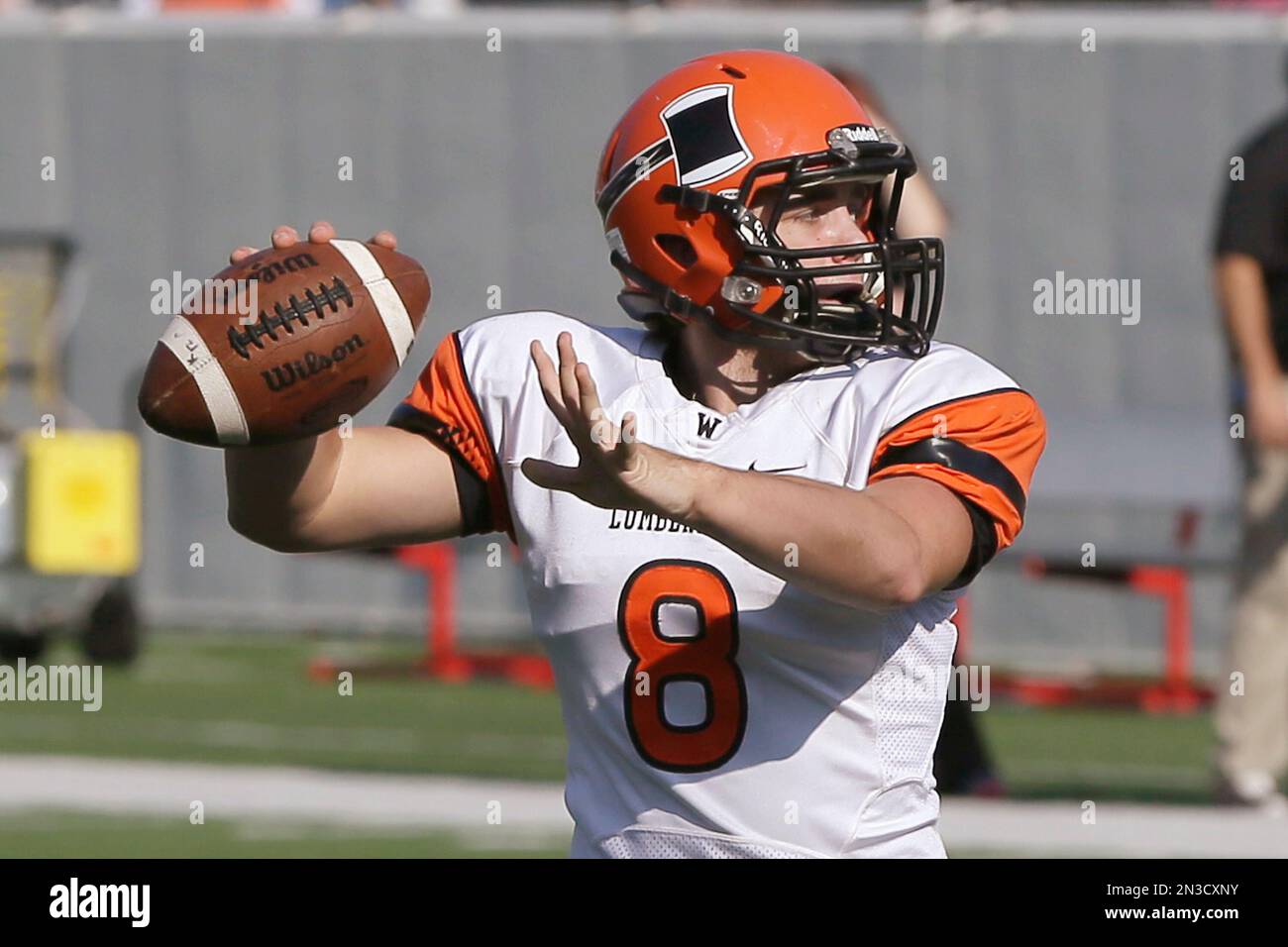 Warren High School quarterback Justin Gorman passes in the first ...