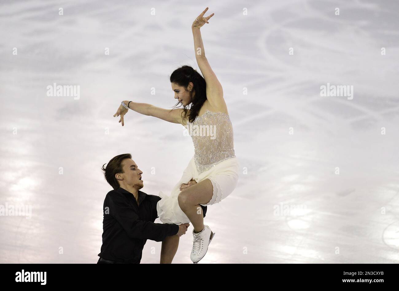 Elena Ilinykh and Ruslan Zhiganshin, of Russia, compete during their ...