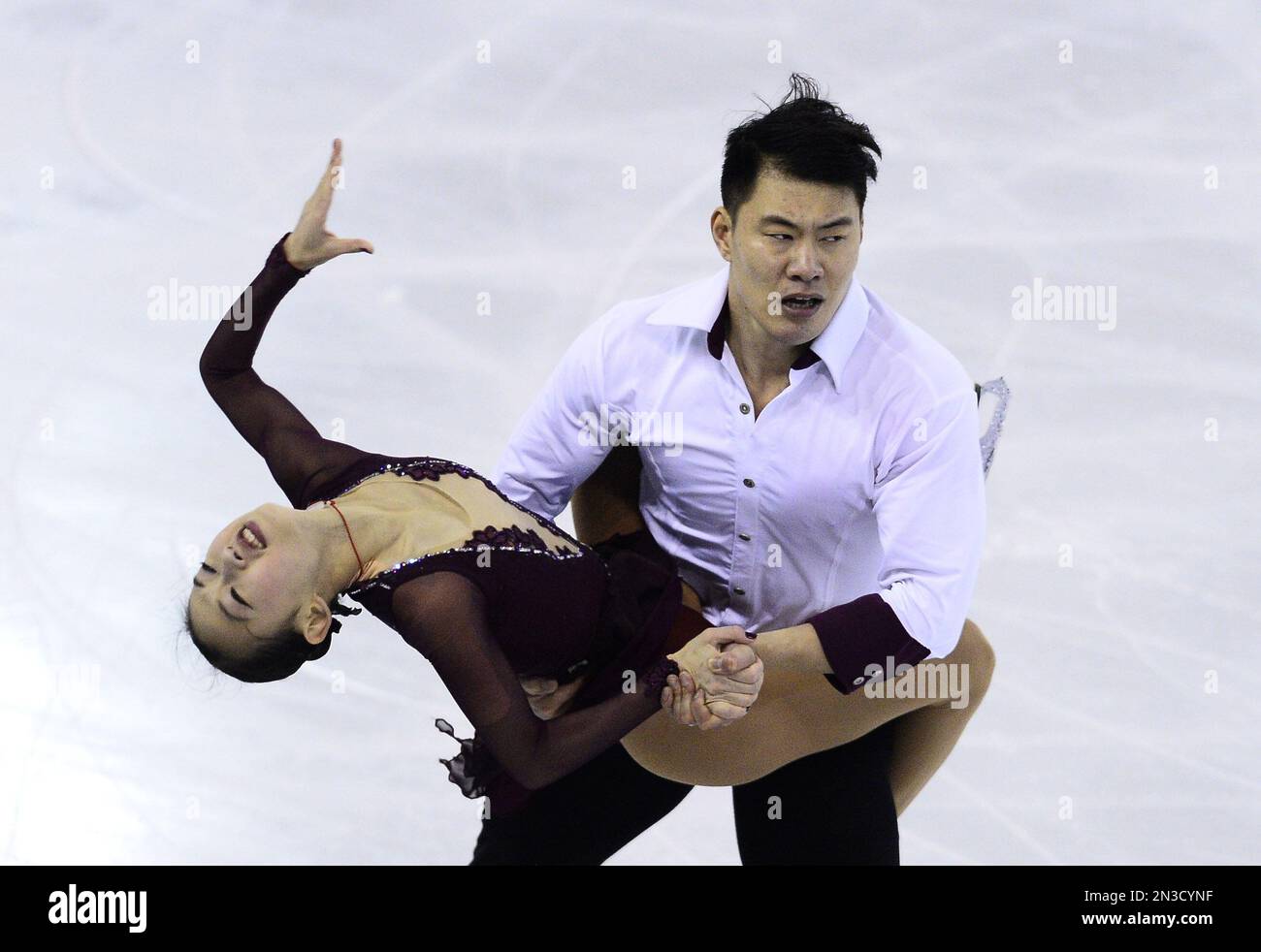 Cheng Peng and Hao Zhang, of China, compete during their Pairs Free ...