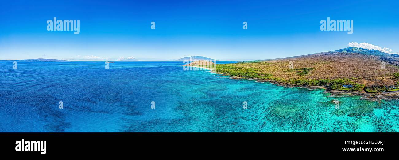 Aerial view of the turquoise water of the Pacific Ocean surrounding the ...