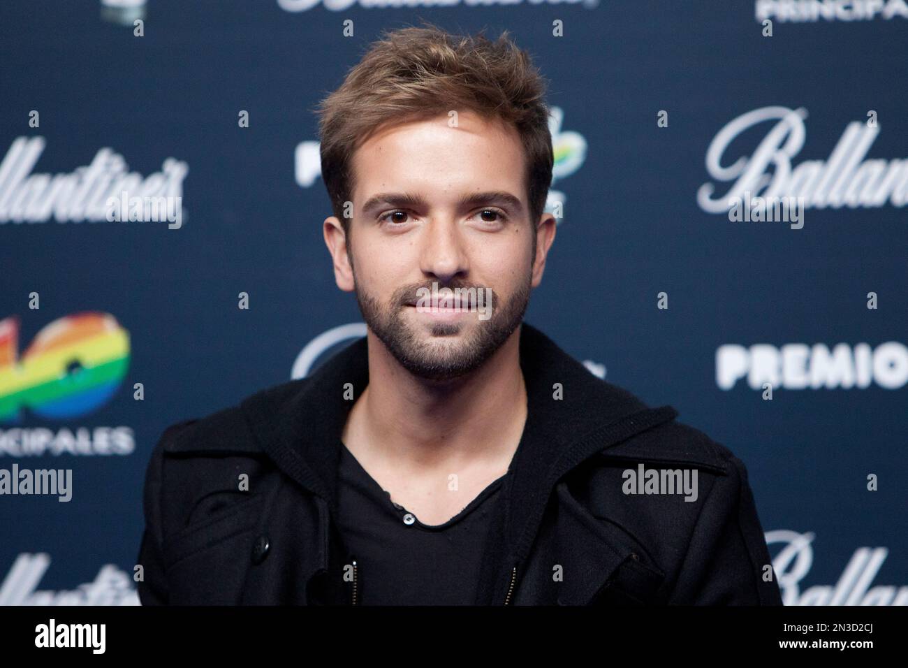 Spanish singer Pablo Alboran poses for photographers during a photocall ...