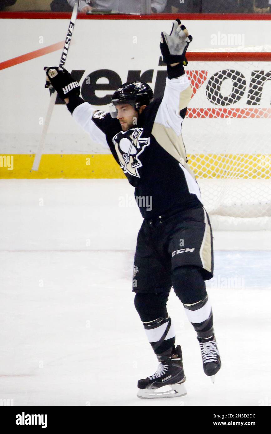 Pittsburgh Penguins' Kris Letang (58) celebrates after scoring during ...