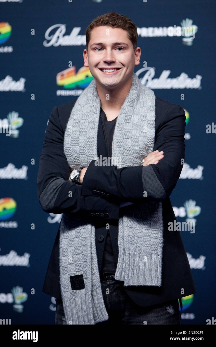 US singer Cris Cab poses for photographers during a photocall before ...