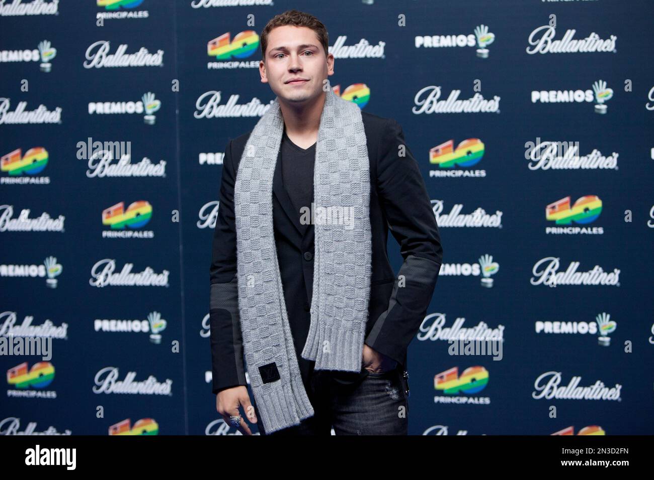 US singer Cris Cab poses for photographers during a photocall before ...