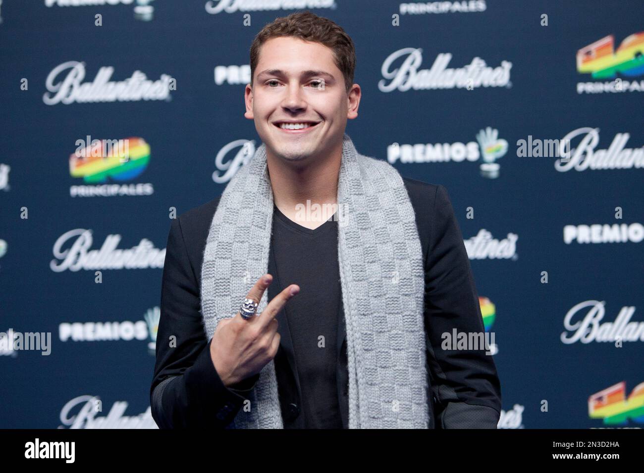 US singer Cris Cab poses for photographers during a photocall before ...
