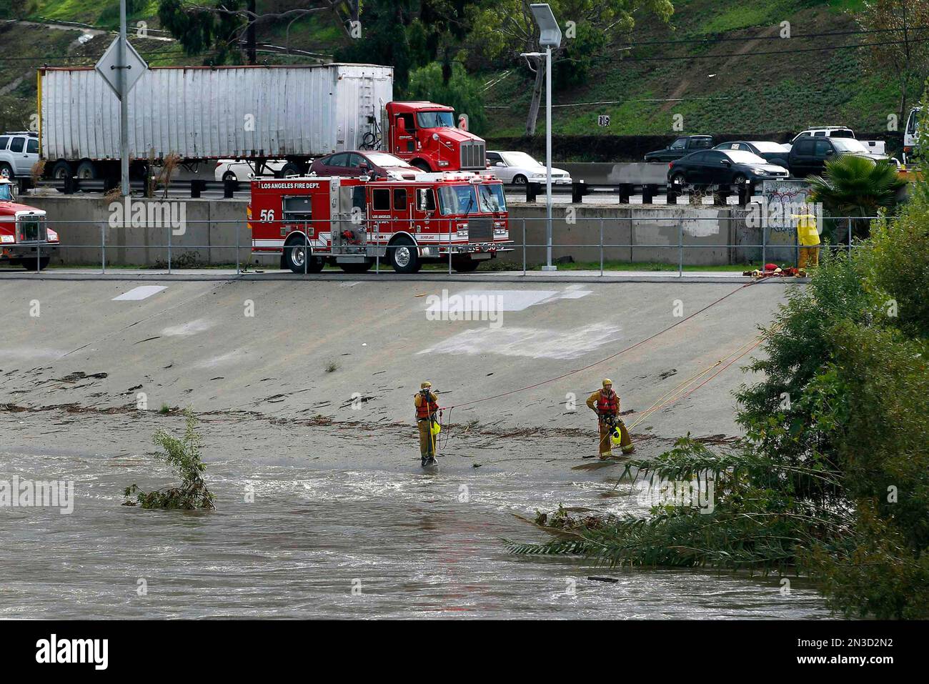 Los Angeles Fire Department Swift-Water Rescue Team members deploy ...