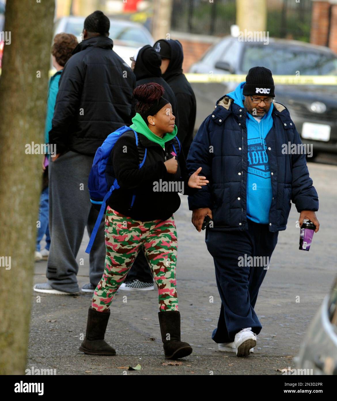 An unidentified student and a parent leave Rosemary Anderson High ...