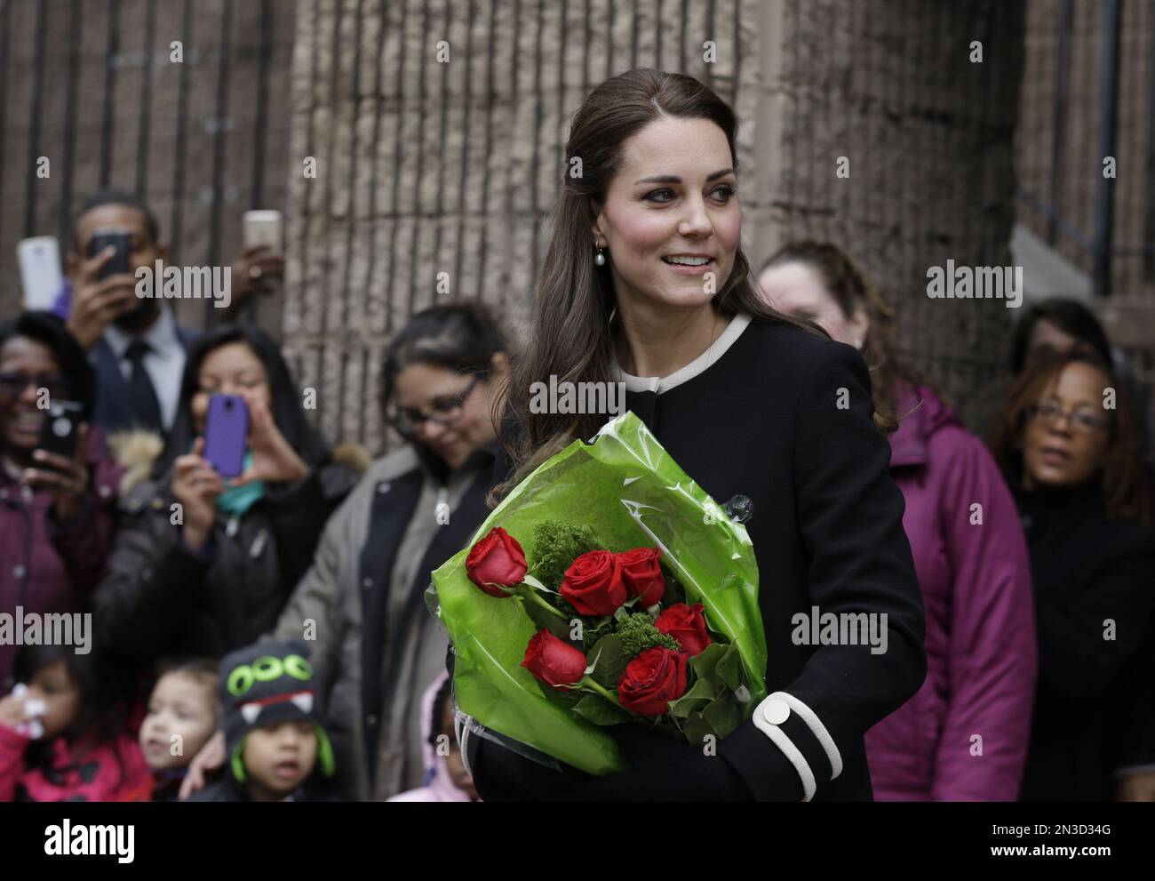 ***POOL PHOTO*** Kate Middleton, the Duchess of Cambridge, receives ...