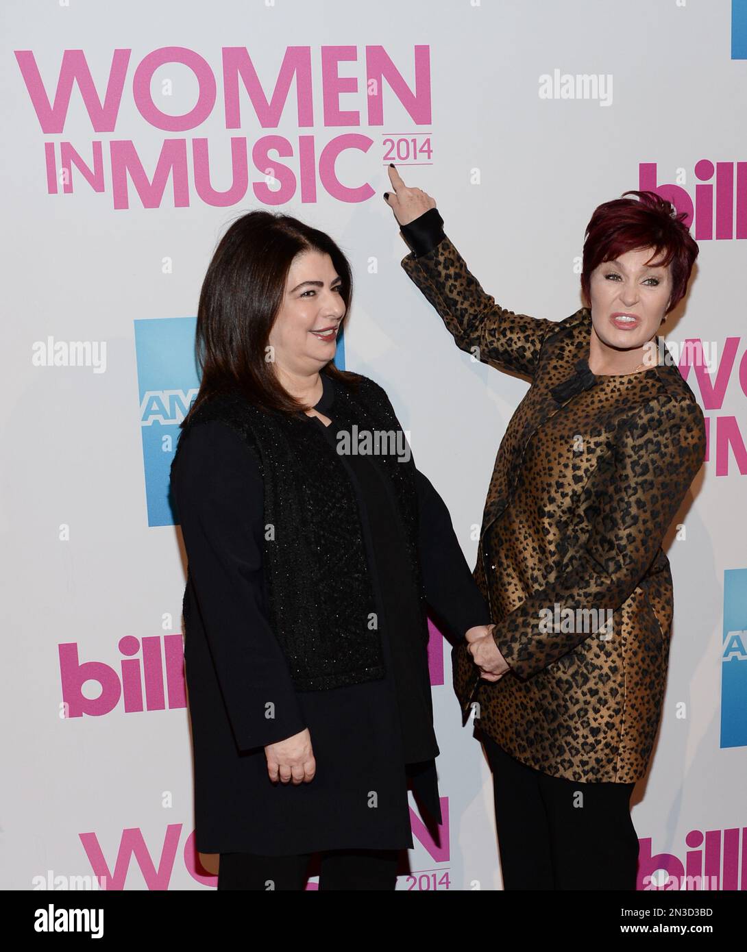 Sharon Osbourne, right, poses with "Power Executive" award recipient ...