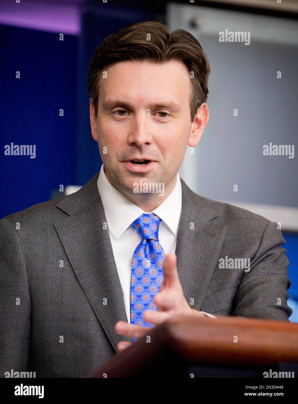White House press secretary Josh Earnest speaks to the media during the ...