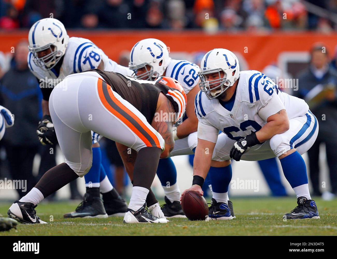 Indianapolis Colts center Khaled Holmes (62) sets to snap the ball ...