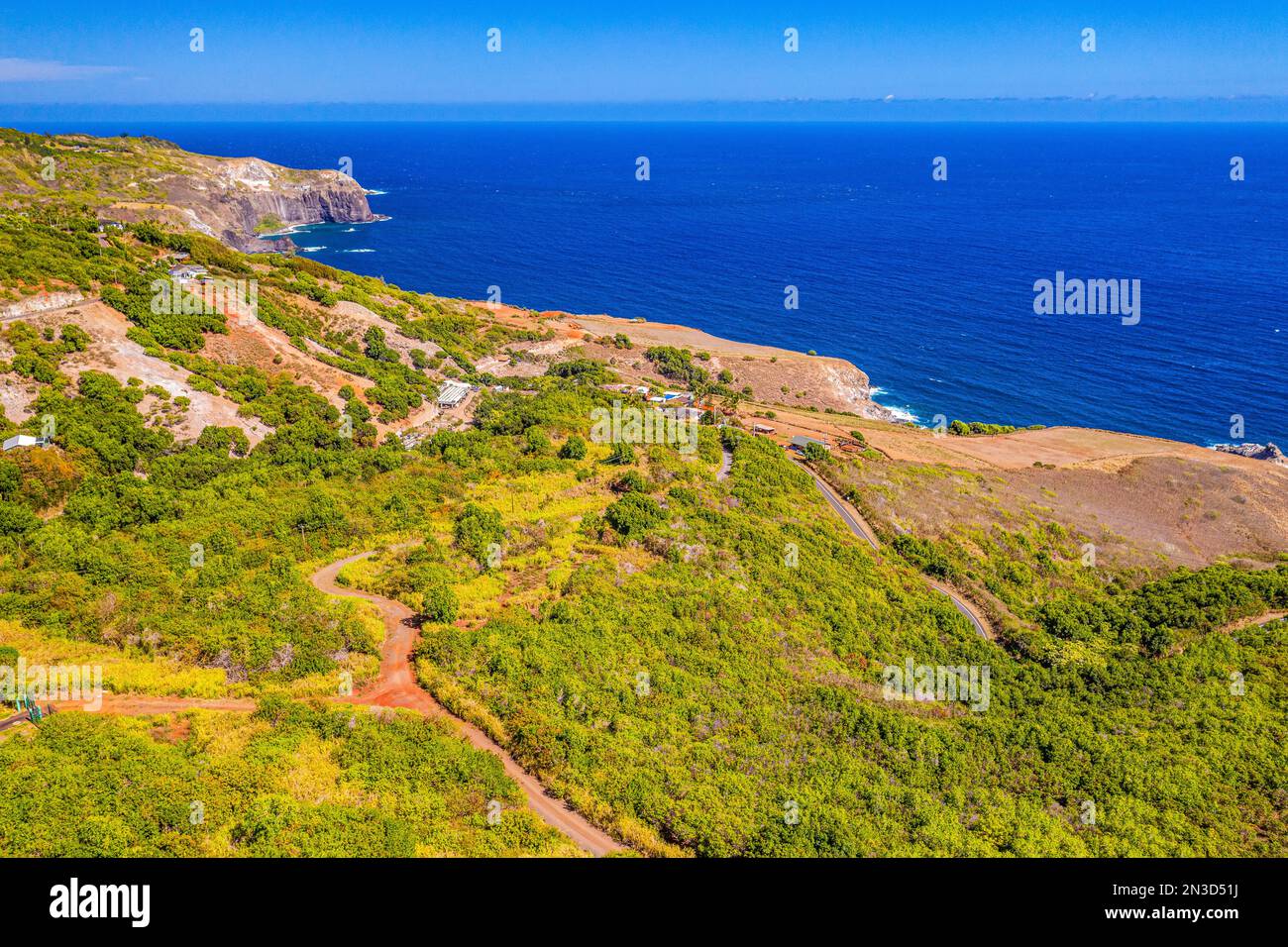 Aerial view of winding roads through the lush hillside of Waihee Ridge ...