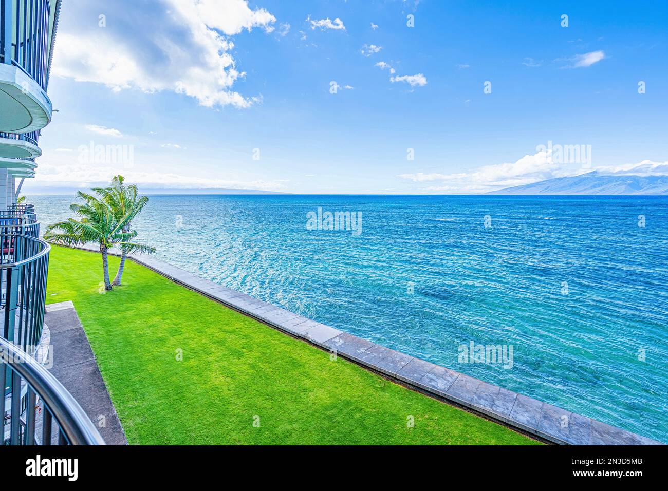 Oceanfront view from balconies in Lahaina with the turquoise water of ...
