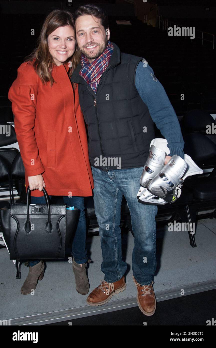 Tiffani Thiessen, left, and Jason Priestley attends the Disney On Ice ...