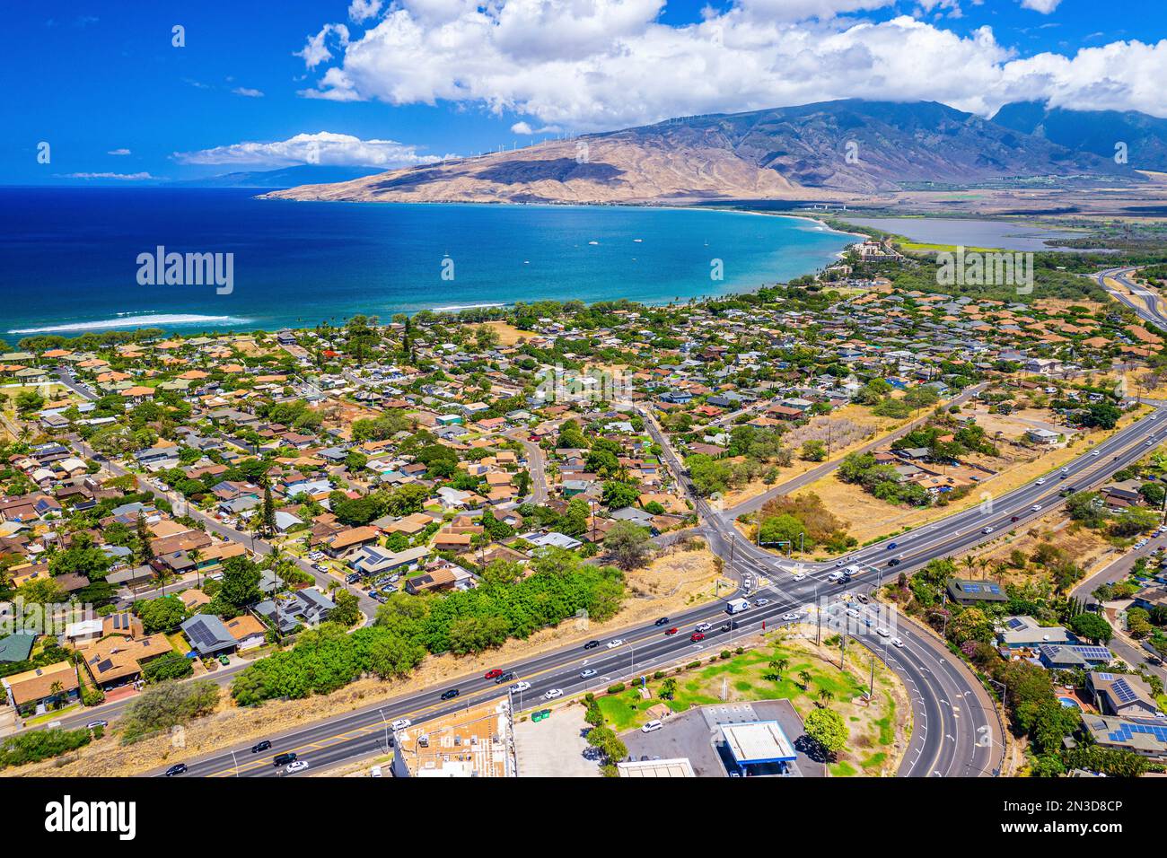 Aerial view of the town and main thoroughfare along the oceanfront of ...