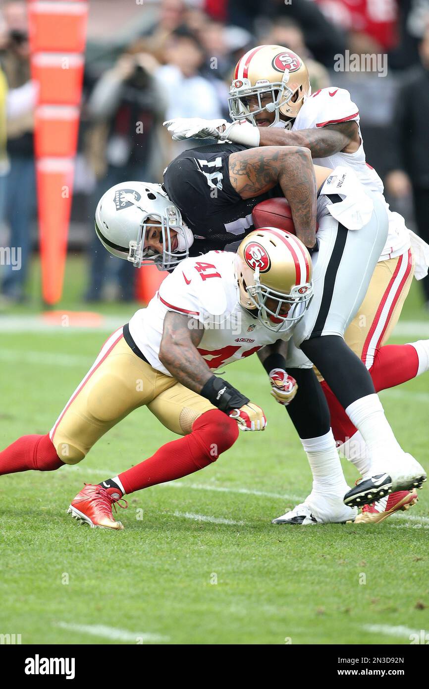 Oakland Raiders tight end Mychal Rivera (8), San Francisco 49ers strong ...