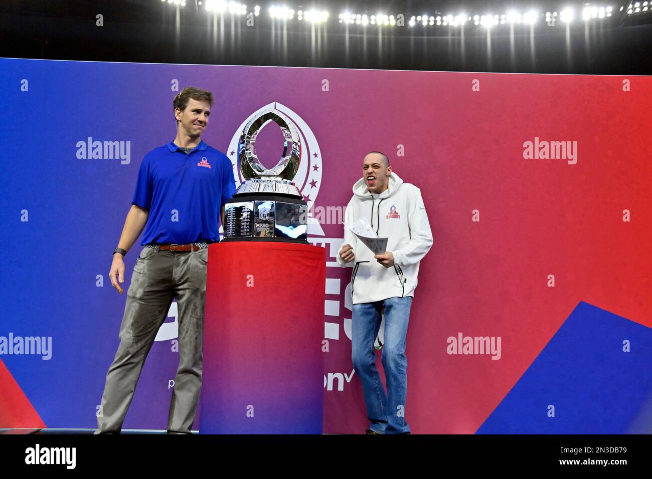 NFC head coach Eli Manning, left, and captain Pete Davidson on stage ...