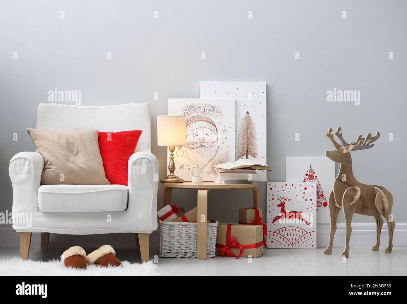 Beautiful Christmas pictures in festive room interior Stock Photo - Alamy