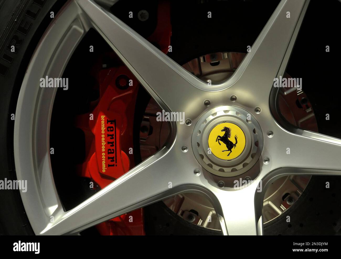 FILE - This May 8, 2013 file photo shows a Ferrari logo on a wheel at ...