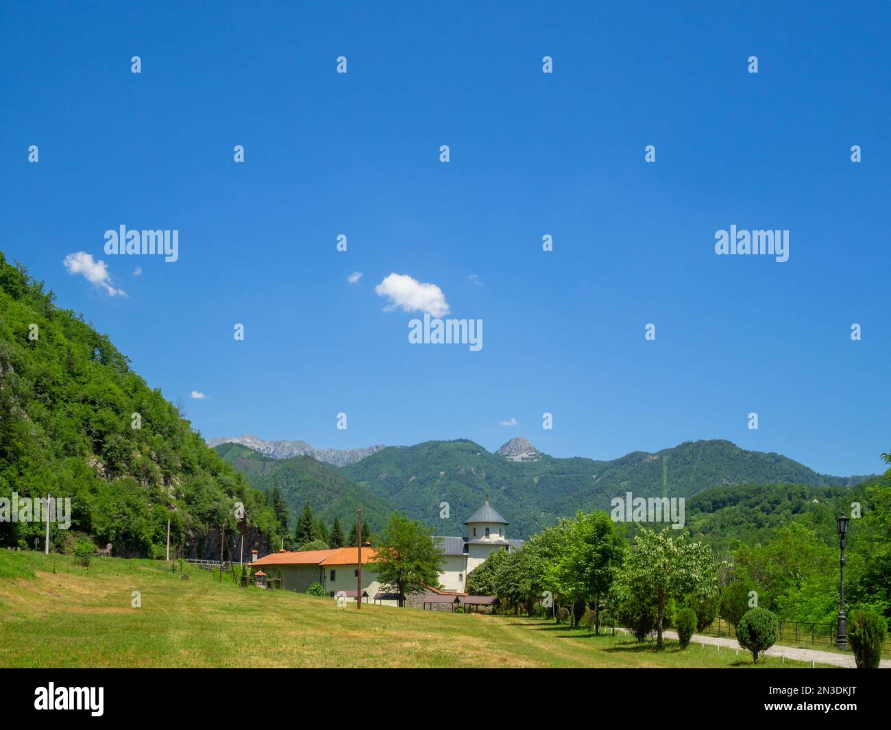 Moraca Monastery below the mountains Stock Photo - Alamy
