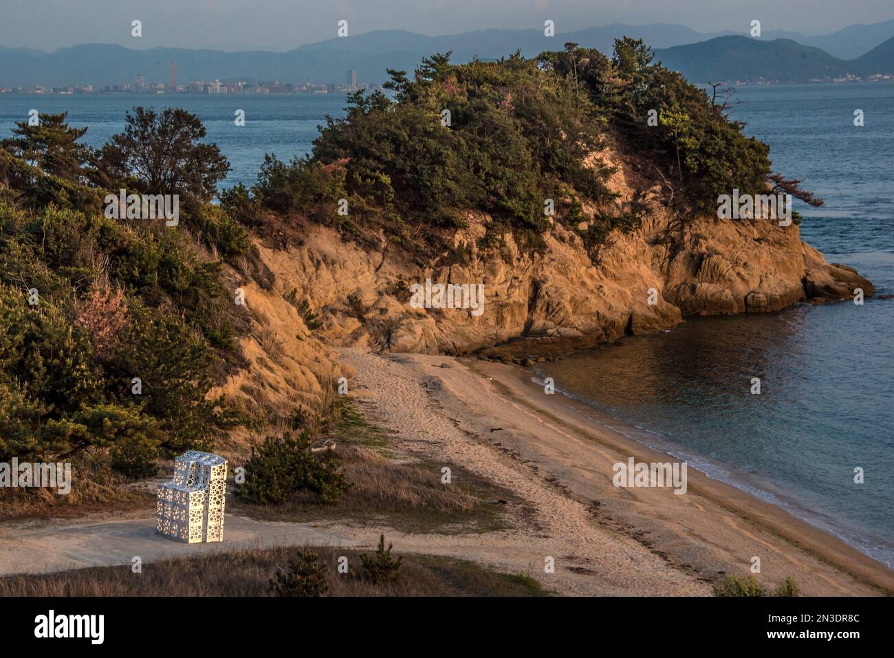 Modern sculpture, art installation on the beach on Naoshima Island, an ...