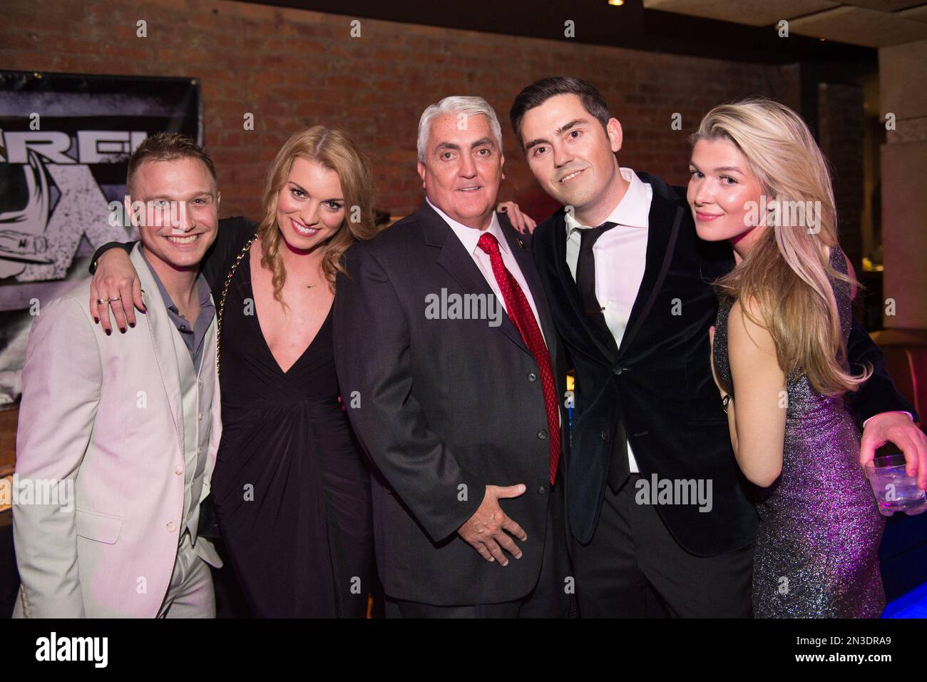 (L-R) Brandon Hubbard, Lindsay Hubbard, COL (RET) J. Manning Bolchoz ...