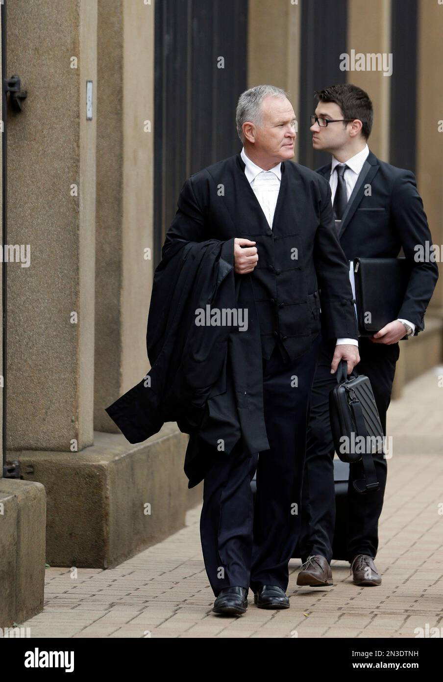Oscar Pistorius's lawyer, Barry Roux, arrives at the high court in ...
