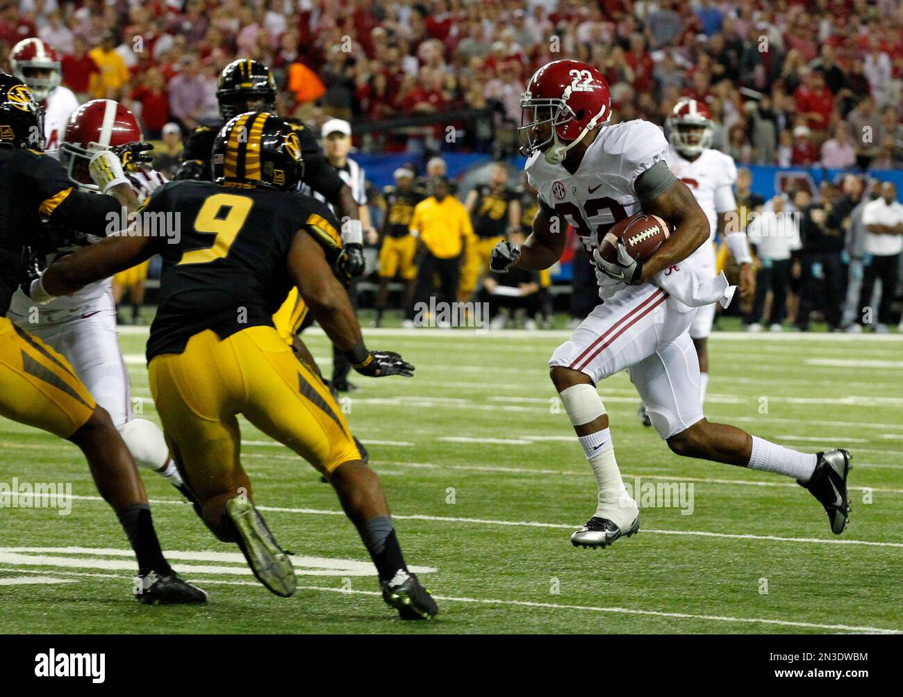 Alabama wide receiver Christion Jones (22) runs for yards after a ...