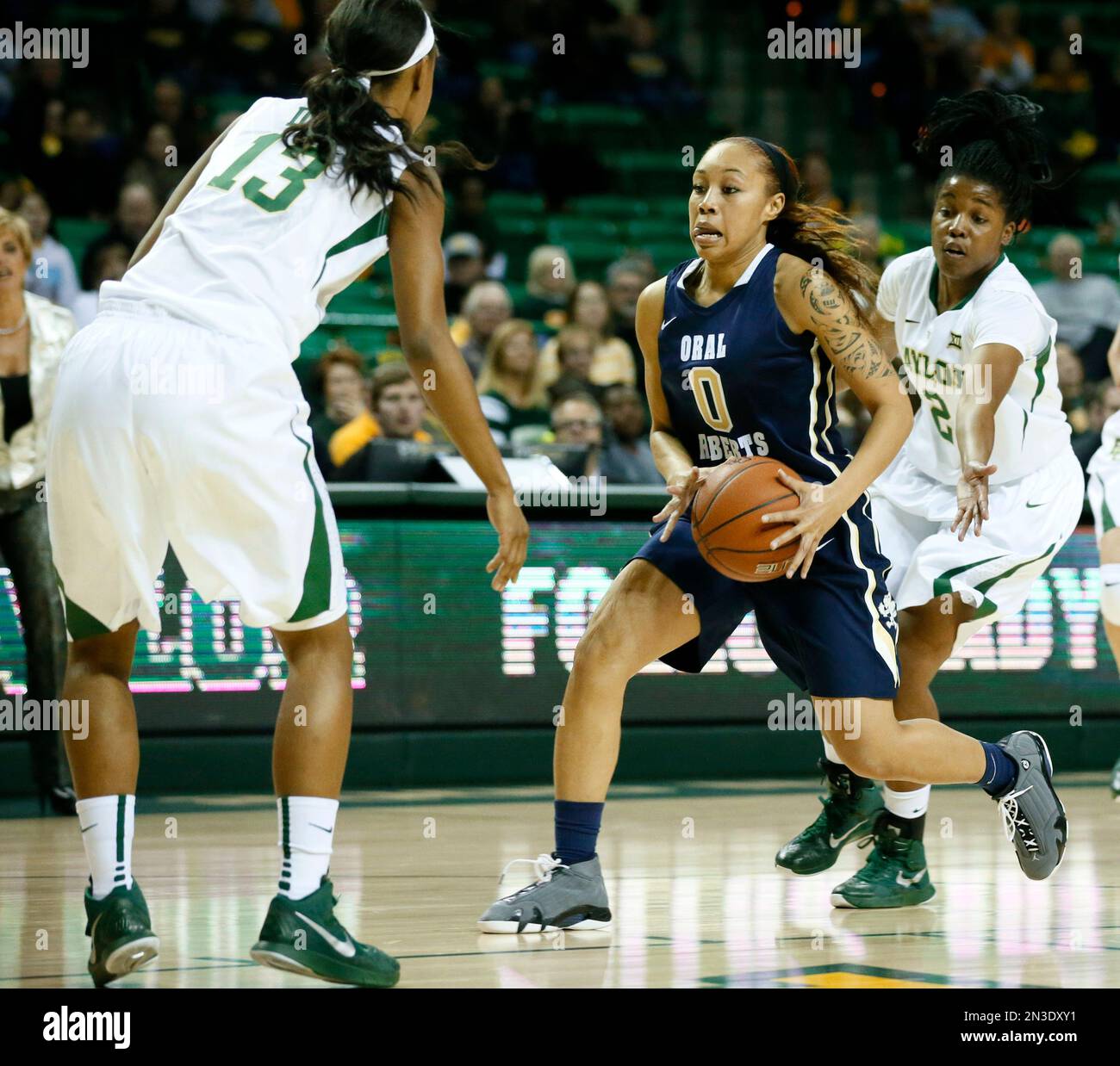 Baylor forward Nina Davis (13) and Niya Johnson (2) defend as Oral ...