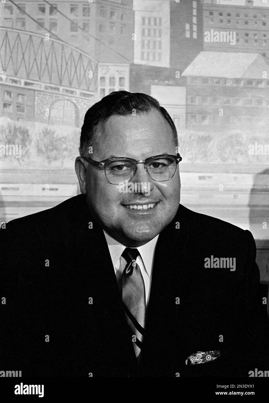 Bob Howsam, new general manager of the Cincinnati Reds, is shown in ...