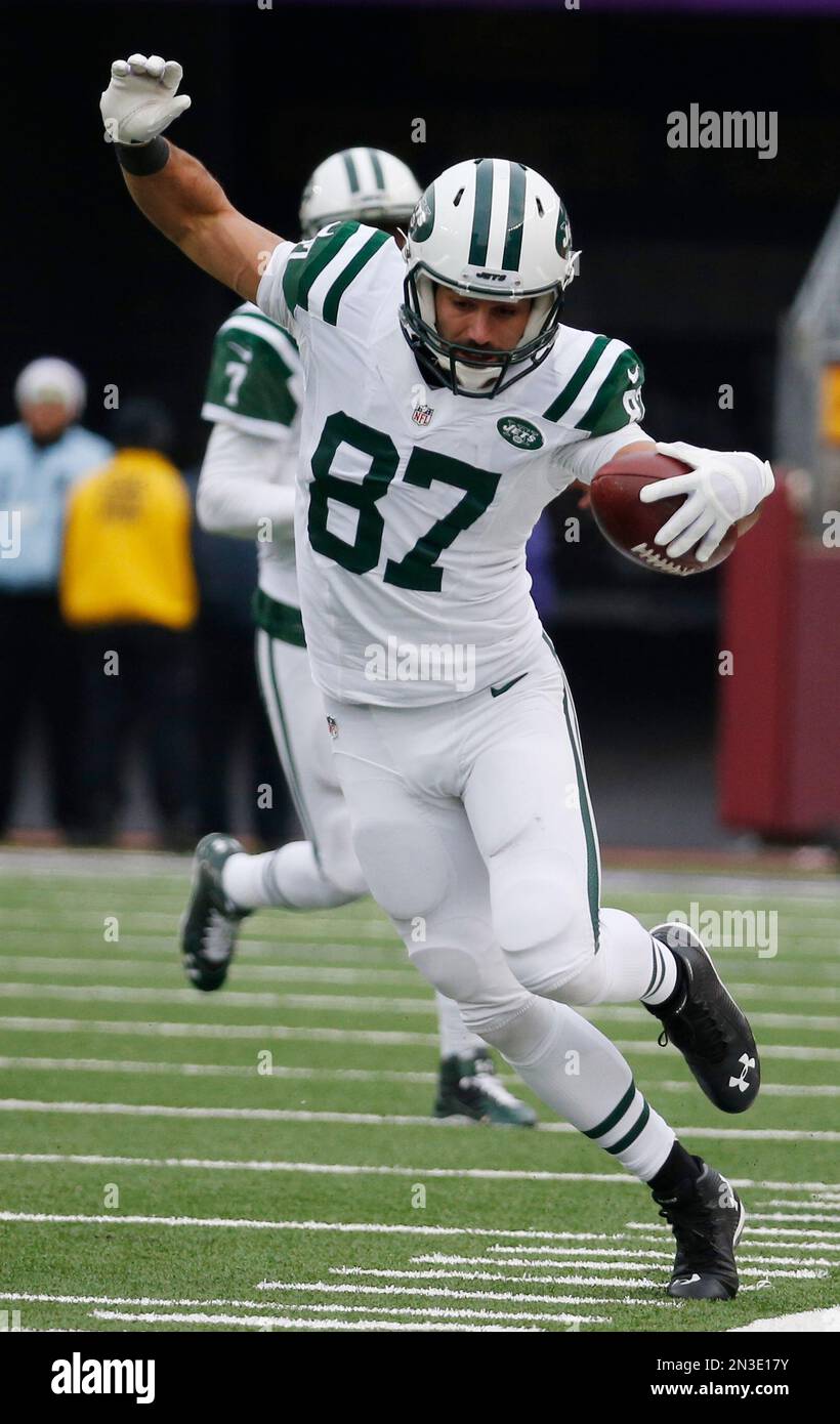 New York Jets wide receiver Eric Decker runs up field after making a ...