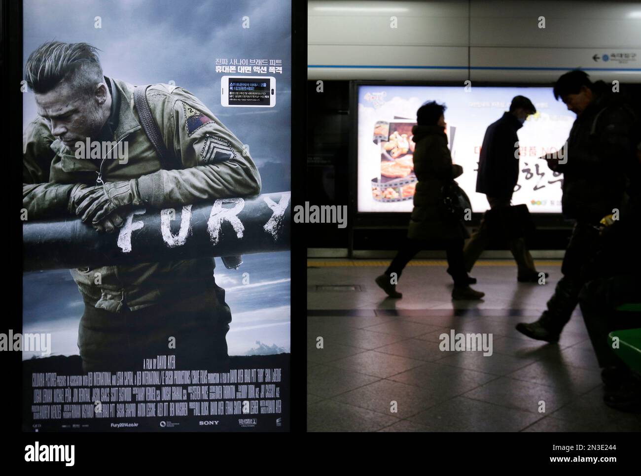 A poster advertising Sony Pictures movie "Fury" is displayed at a subway station in Seoul, South ...