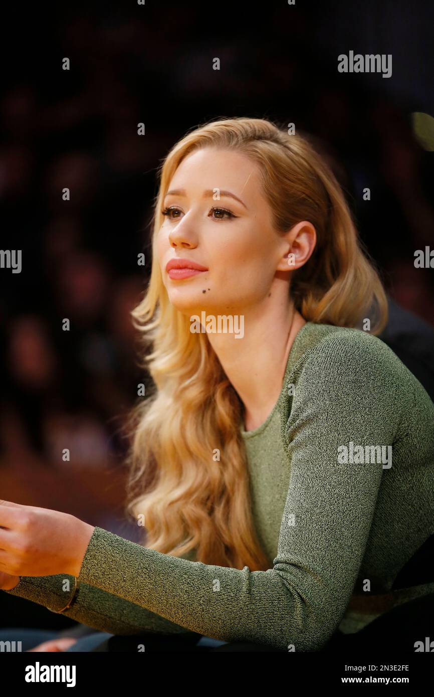 Australian recording artist Iggy Azalea sits courtside at the NBA ...