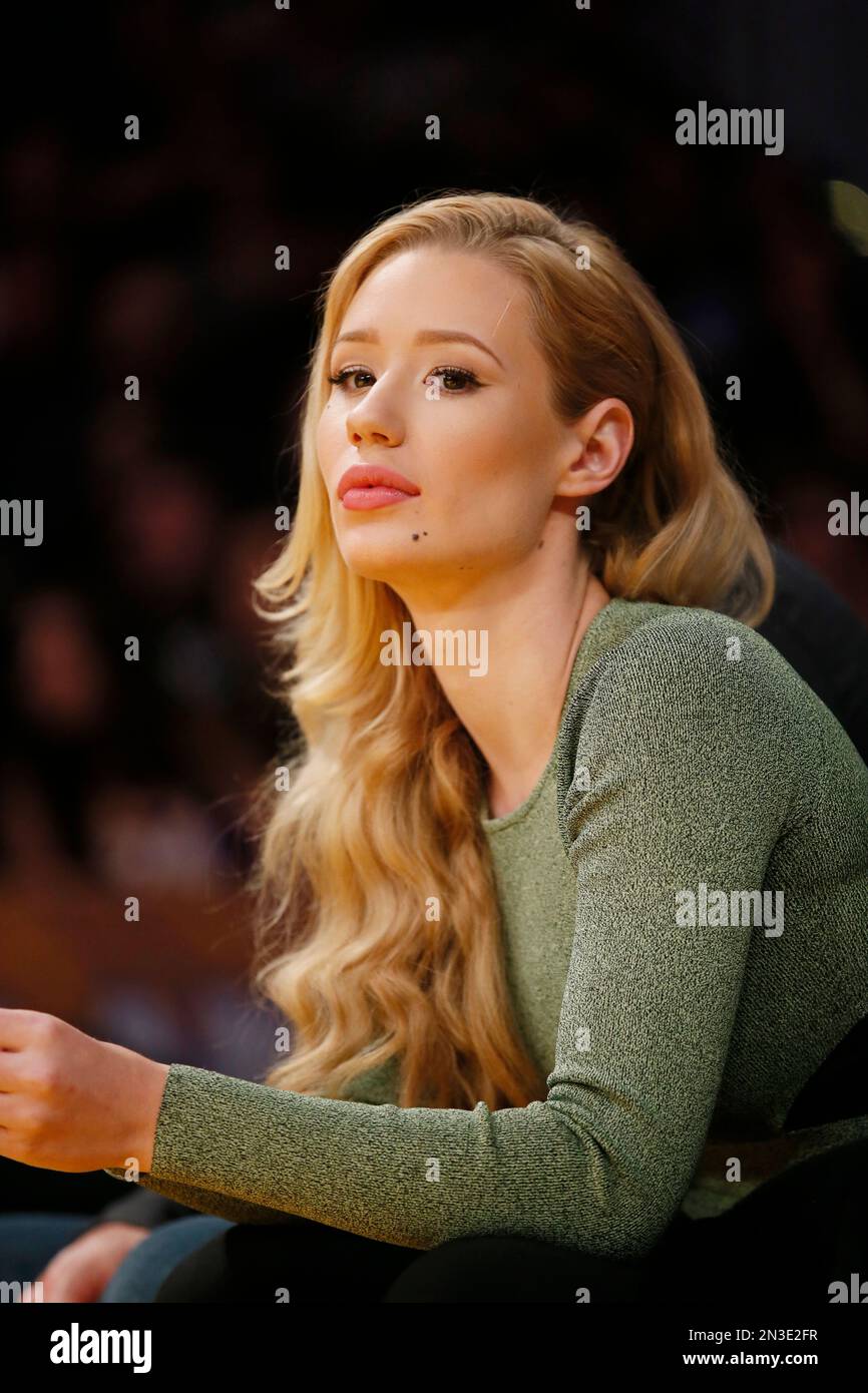 Australian recording artist Iggy Azalea sits courtside at the NBA ...