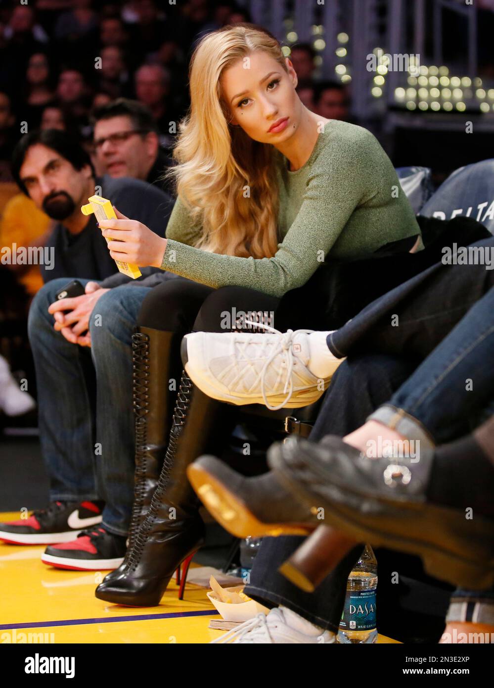 Australian recording artist Iggy Azalea sits courtside at the NBA ...