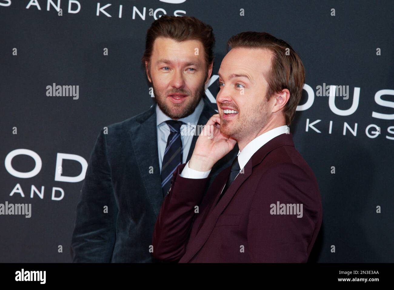 Joel Edgerton, left, and Aaron Paul, right, attend the premiere of ...