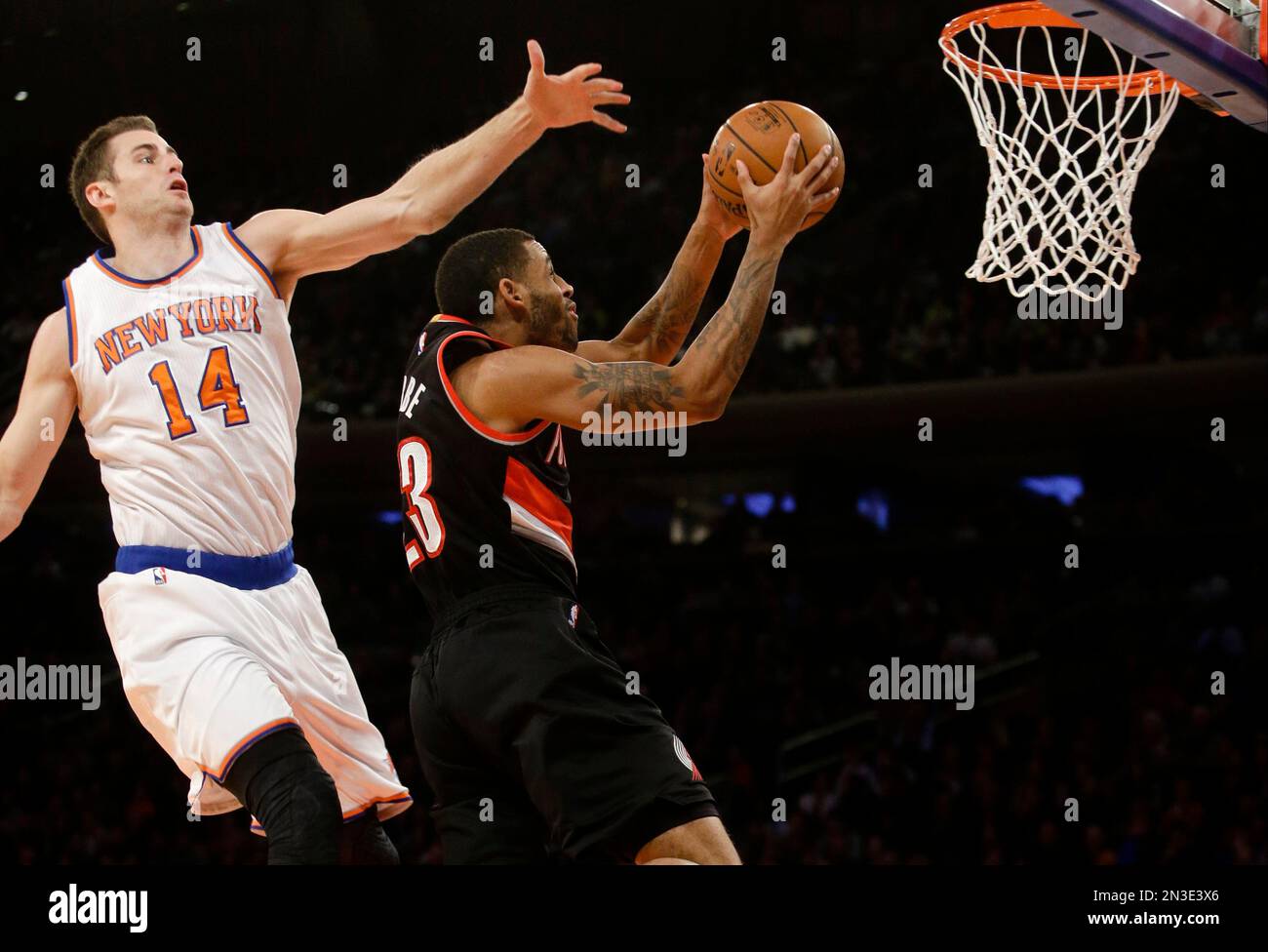 Portland Trail Blazers' Allen Crabbe (23) drives past New York Knicks ...