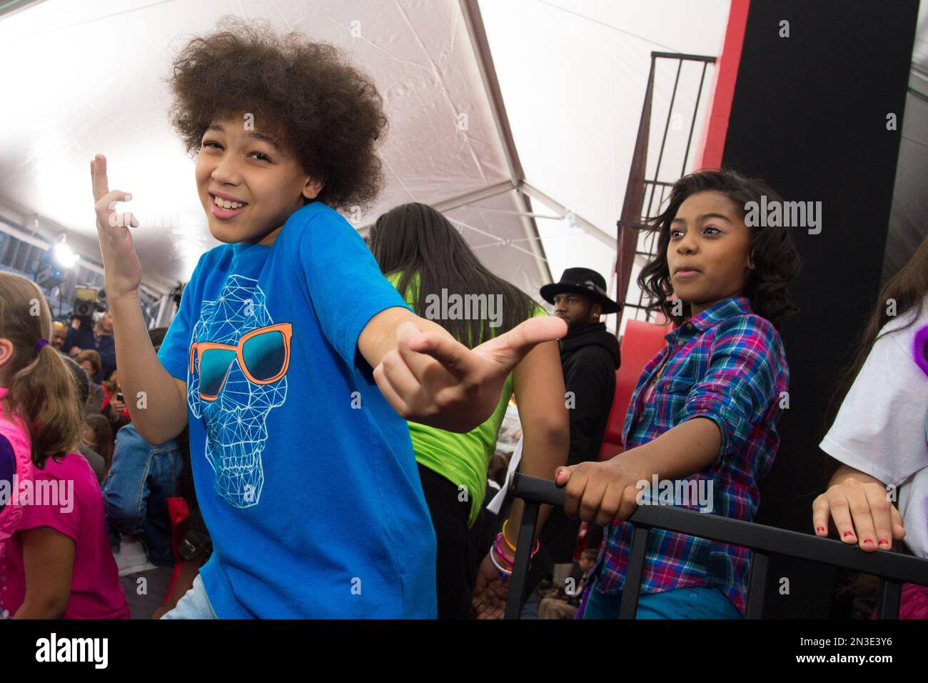 A member of the P.S. 153 Chorus performs at the world premiere of ...