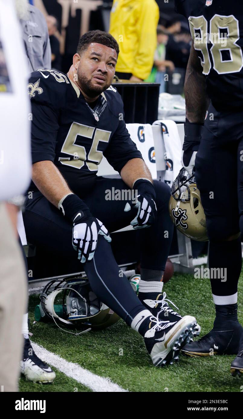 New Orleans Saints center Jonathan Goodwin (55) sits injured on the ...