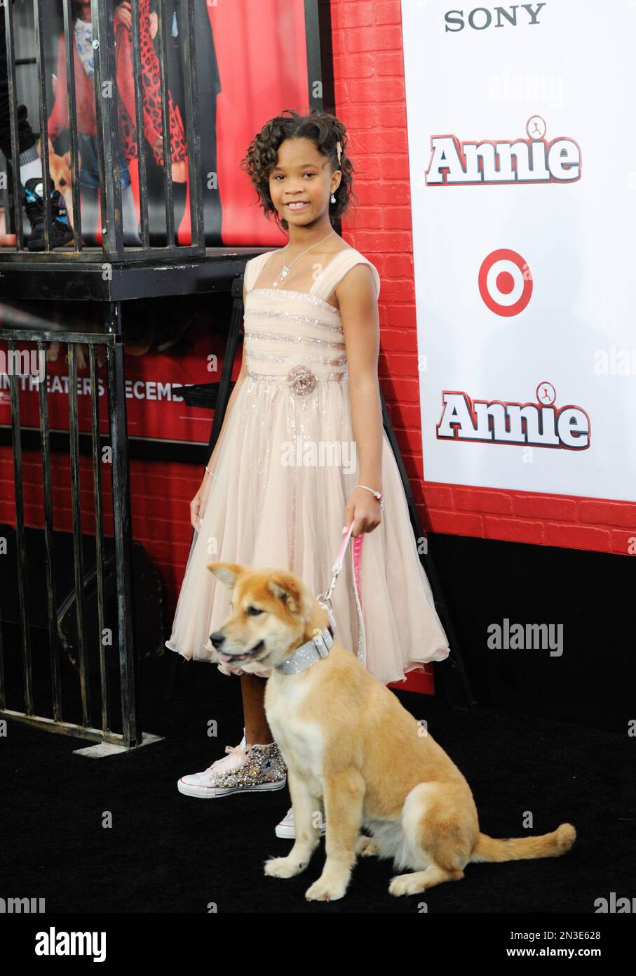 Actress Quvenzhane Wallis poses with Marti the dog at the world ...