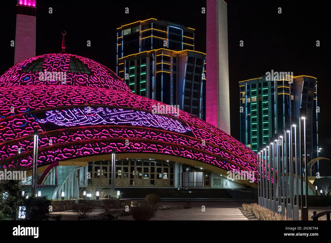 Close-up of the Aimani Kadyrova Mosque illuminated at night; Argun ...