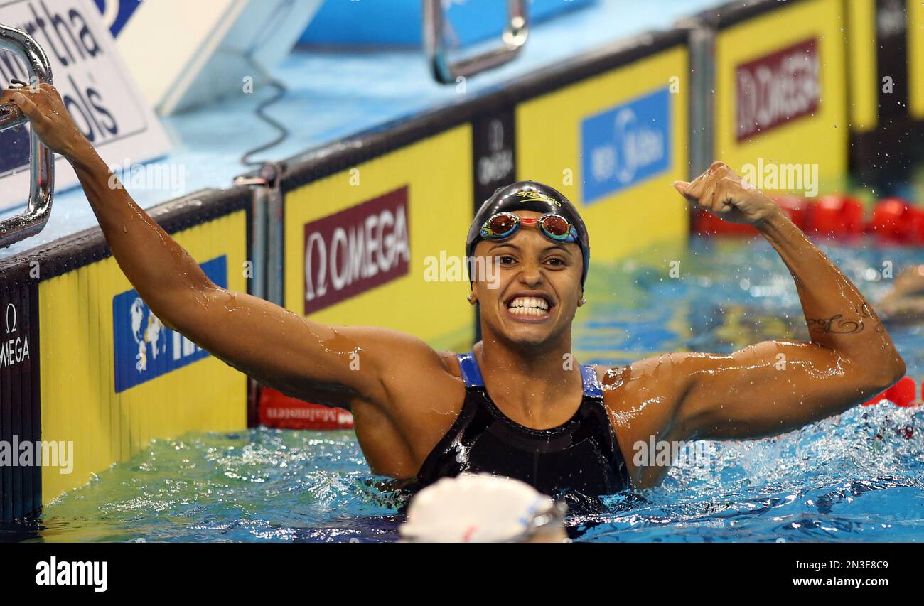 Jamaica's Alia Atkinson celebrates after winning the women's 100m ...